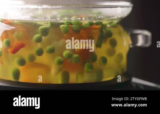 Glass pot boiling vegetable soup Stock Videos & Footage - HD and 4K ...