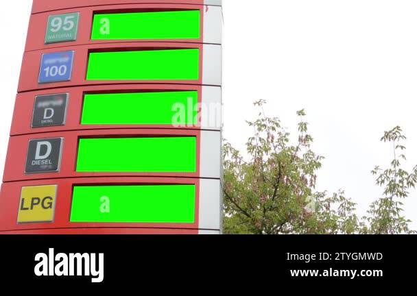 fuel station - information panel with fuel prices - green screen - tree ...