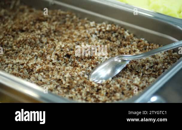 close-up, buckwheat porridge on showcase of Self service restaurant ...