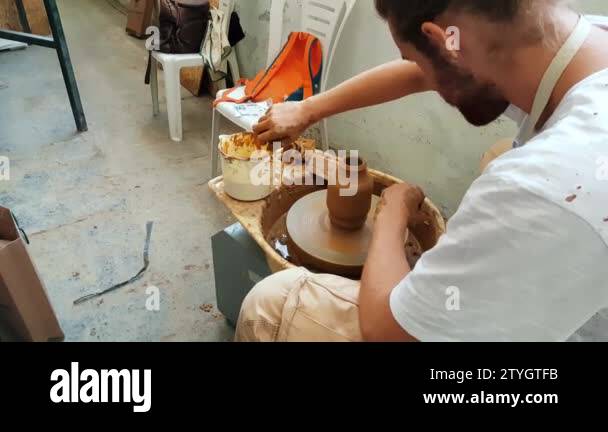 Pottery artist making clay pot at the 12th International Eskisehir ...