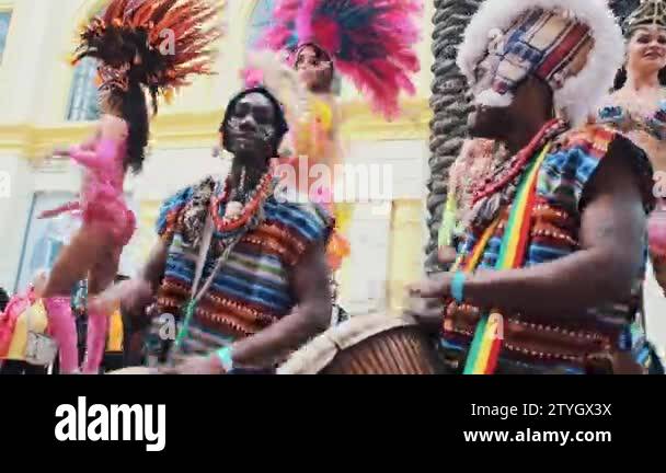 MOSCOW, RUSSIA- FEBRUARY 29, 2020: African drummers in ethnic clothes ...