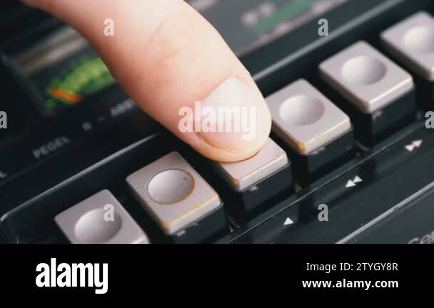 Pushing Play Button on a Vintage Tape Recorder. Transistor retro radio ...