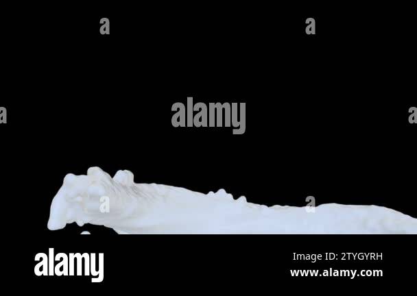 3D animation of milk flow in slow motion against black Stock Video ...