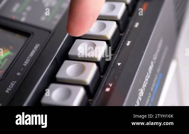 Pushing Play Button on a Vintage Tape Recorder. Transistor retro radio ...