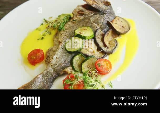 Plate baked whole fish Stock Videos & Footage - HD and 4K Video Clips ...