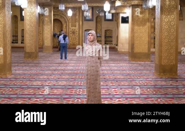Woman Dressed in a Nuns Robe Stands Inside an Islamic Temple. Egypt ...