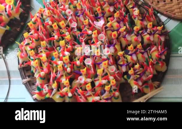 Tohe, the traditional toys in Vietnam made by colored rice powder Stock ...