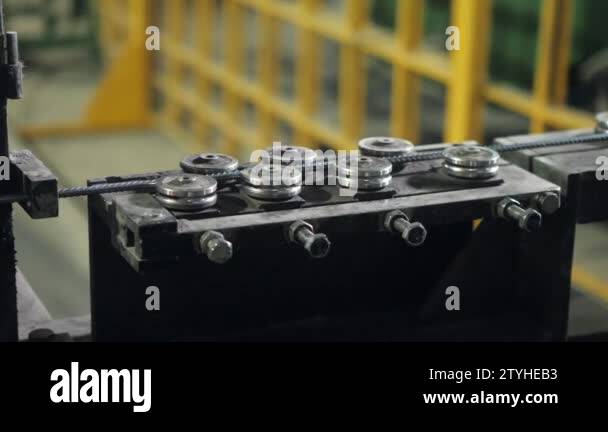 Closeup rollers of Large industrial machine for welding of rebar and ...