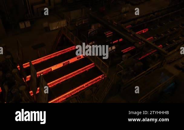 Steel mill plant. Metal tube production line at metal factory. Hot ...