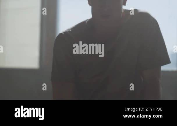 Portrait of young passionate hip-hop dancer performing in front of ...