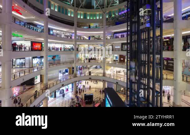 KUALA LUMPUR, MALAYSIA - JANUARY 2016: famous petronas towers suria klcc mall walking by circa ...