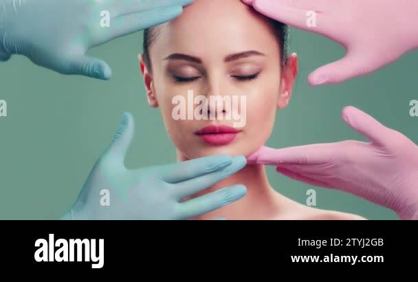 Slow motion clip - Doctor checks a skin before plastic surgery. Face ...