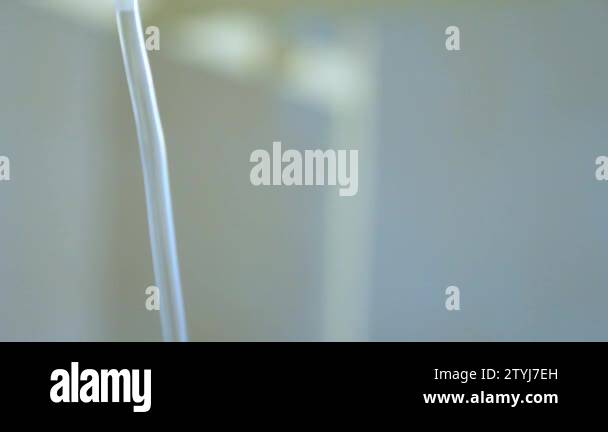 Infusion drip, drop counter in hospital background. Preparing for ...