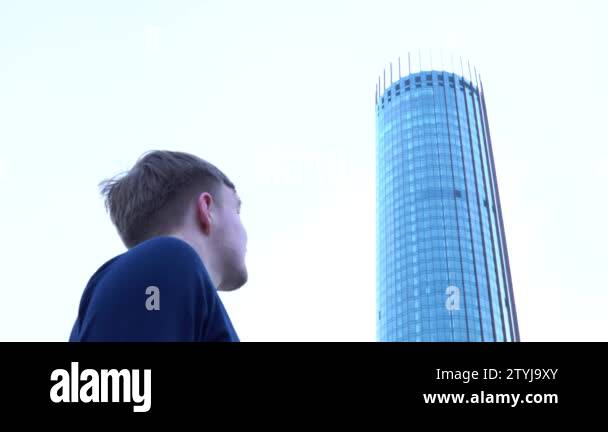 Young man looking up skyscraper Stock Videos & Footage - HD and 4K ...