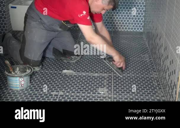 Man tiling floor bathroom Stock Videos & Footage - HD and 4K Video ...