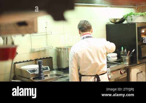 Chefs cooking in restaurant kitchen Stock Videos & Footage - HD and 4K ...