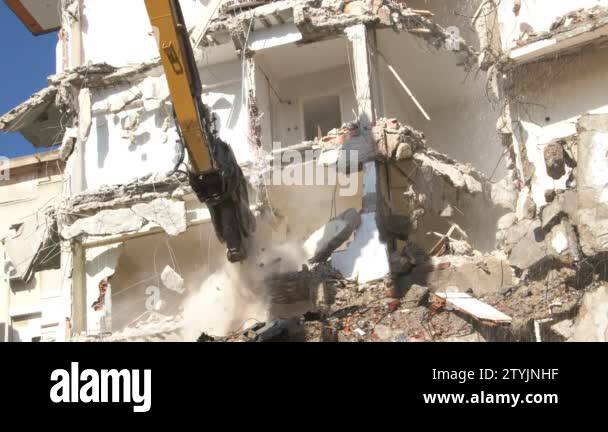 Hydraulic breaker and column cutter excavator rear machine working in ...