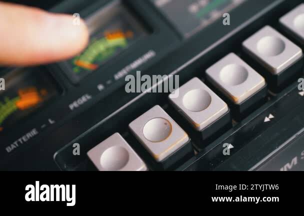 Pushing Play Button on a Vintage Tape Recorder. Transistor retro radio ...