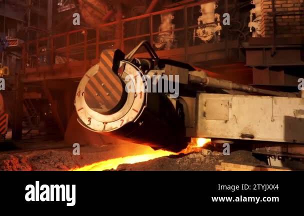 Molten steel in high temperature melting at the metallurgical plant ...