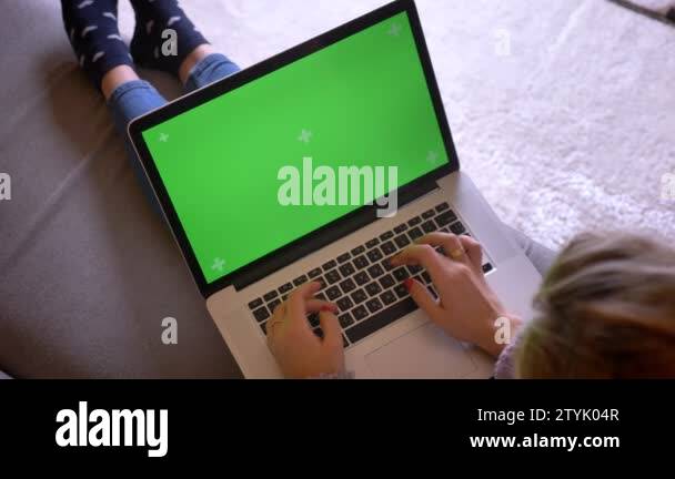 Closeup back view shoot of adult caucasian attractive female typing on ...