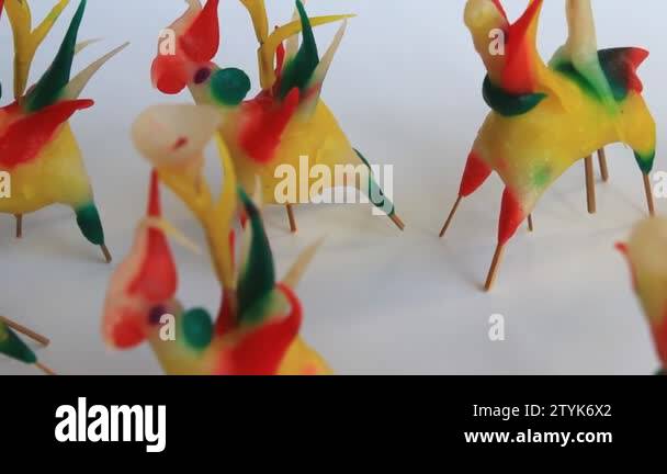 Tohe, the traditional toys in Vietnam made by colored rice powder Stock ...