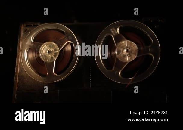 Old vintage reel to reel player and recorder on dark toned foggy ...