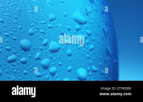 Condensation on surface of plastic bottle of table water, close shot ...