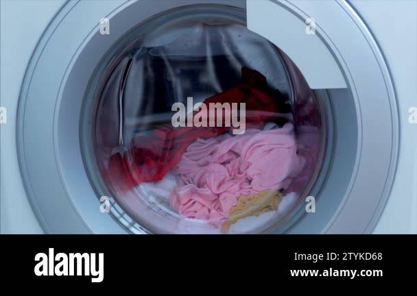 Womans Hand Closes the Door of the Washing Machine and Turns on the ...