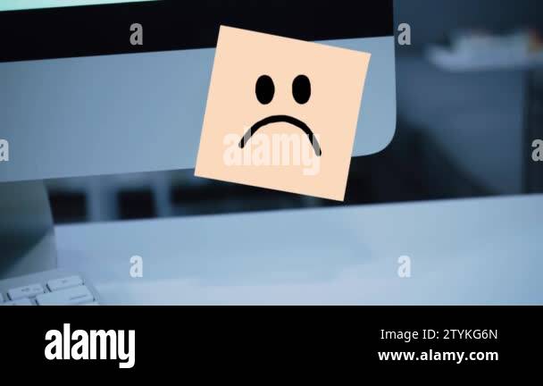 Sad smile. Sad face painted on a sticker on the monitor. Message ...