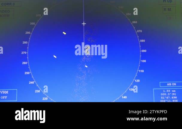 Radar monitor with a small cross, several white spots, 360 degrees and ...