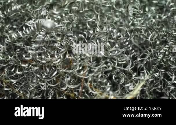 Scrap metal debris strip from metal lathe machine Stock Video Footage ...