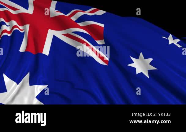 Australian flag in slow motion. The flag develops smoothly in the wind ...