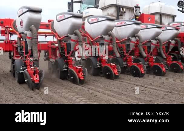 close-up, tractor with special precision planters, seeder is working in ...
