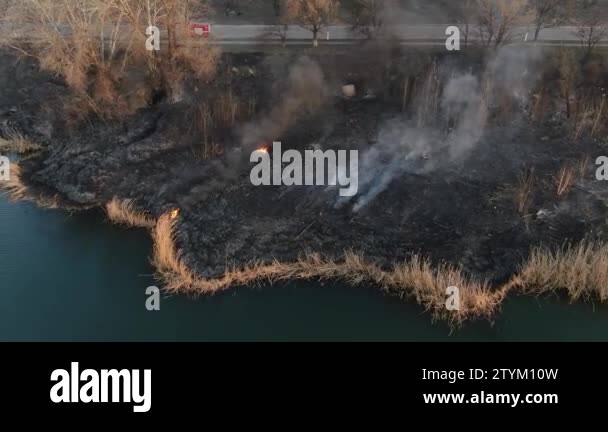 Epic aerial view of smoking wild fire. Large smoke clouds and fire ...