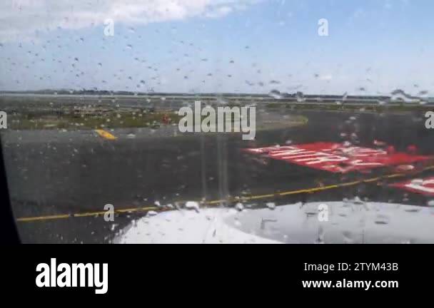 Airport runway view sign no entry through moving plane window before ...