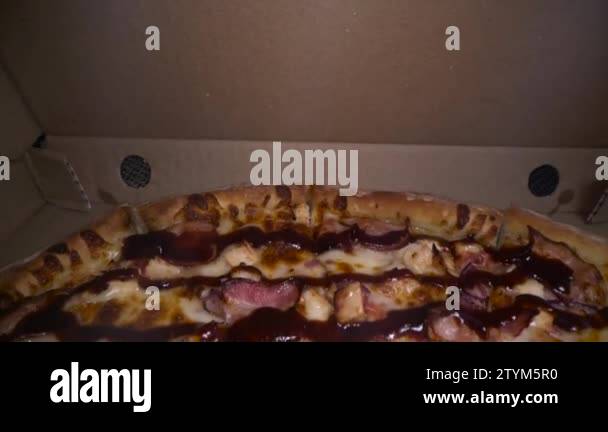 Inside of a Pizza box. Classic pizza in a cardboard box. Wide angle ...