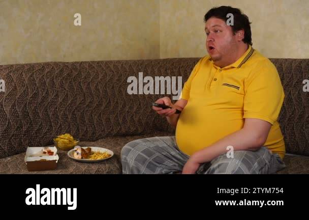Fat man sitting eating Stock Videos & Footage - HD and 4K Video Clips ...
