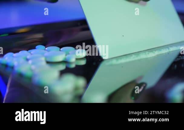 Silver tray with powder drugs, money and pills. Women preparing line o ...