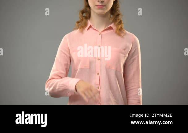Female signing love in asl, text on background, nonverbal communication ...