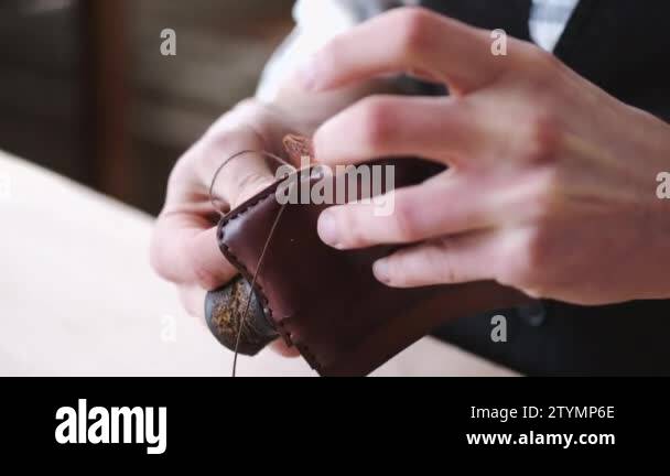 Wood slicker hand stitching Stock Videos & Footage - HD and 4K Video ...