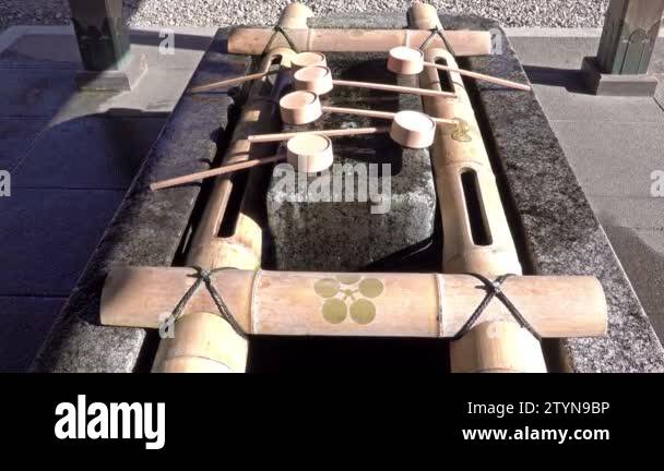 Water ablutions pavilion for a ceremonial purification at Oyama Shrine ...