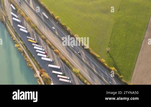 Top down aerial view of highway interstate road with fast moving ...