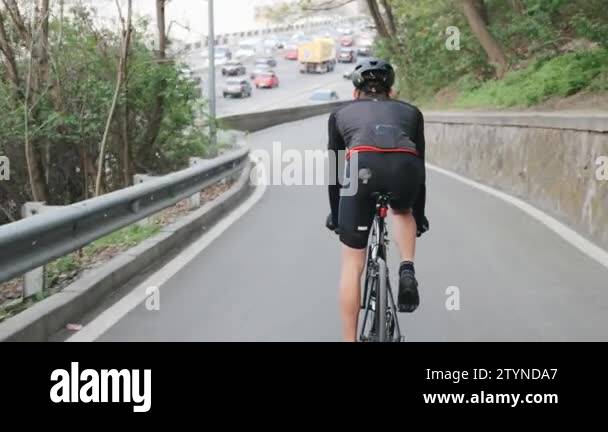 Cycling busy road Stock Videos & Footage - HD and 4K Video Clips - Alamy
