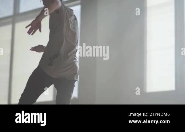 Two boys dancing in abandoned building. Teenagers making dance move ...