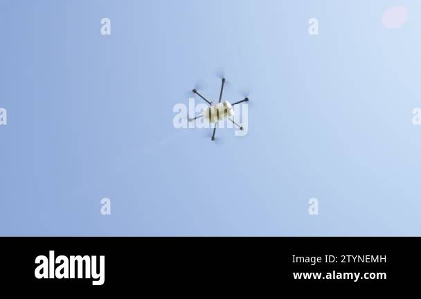 CLOSE UP: Drone delivery of illegal drugs. UAV aircraft flying drug ...