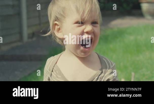 Cheeky child Stock Videos & Footage - HD and 4K Video Clips - Alamy