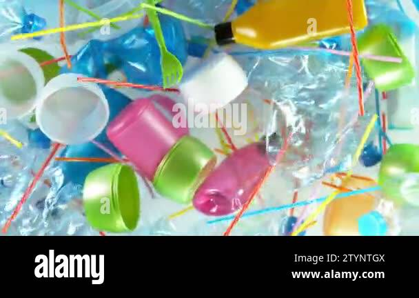 Super slow motion of plastic waste flying into the air. Filmed on high ...