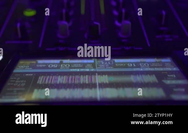 Close up DJ mixer player, laptop screen and sound console for house ...