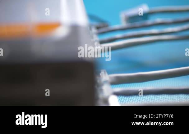 Fingers Plugging Ethernet Cable with RJ45 into Port of Ethernet Router ...