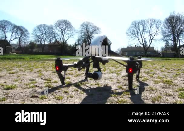 Large, professional unmanned aerial vehicle also known as a quadcopter ...